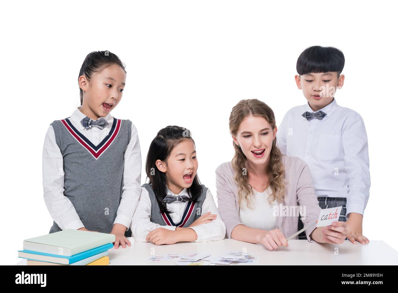 Female teachers guide students learning Stock Photo - Alamy