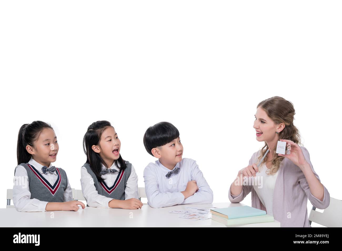 Female teachers guide students learning Stock Photo - Alamy