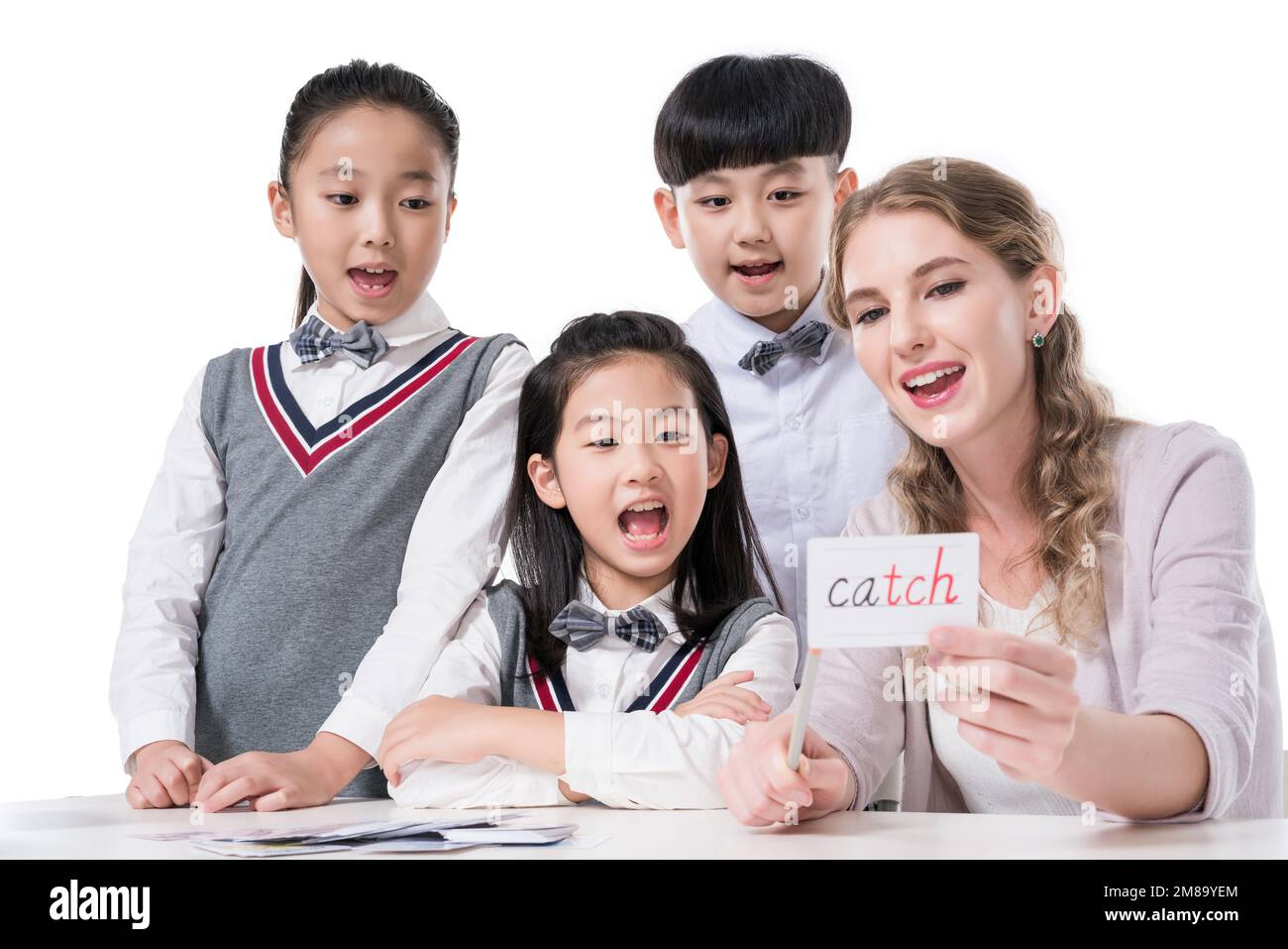 Female teachers guide students learning Stock Photo - Alamy