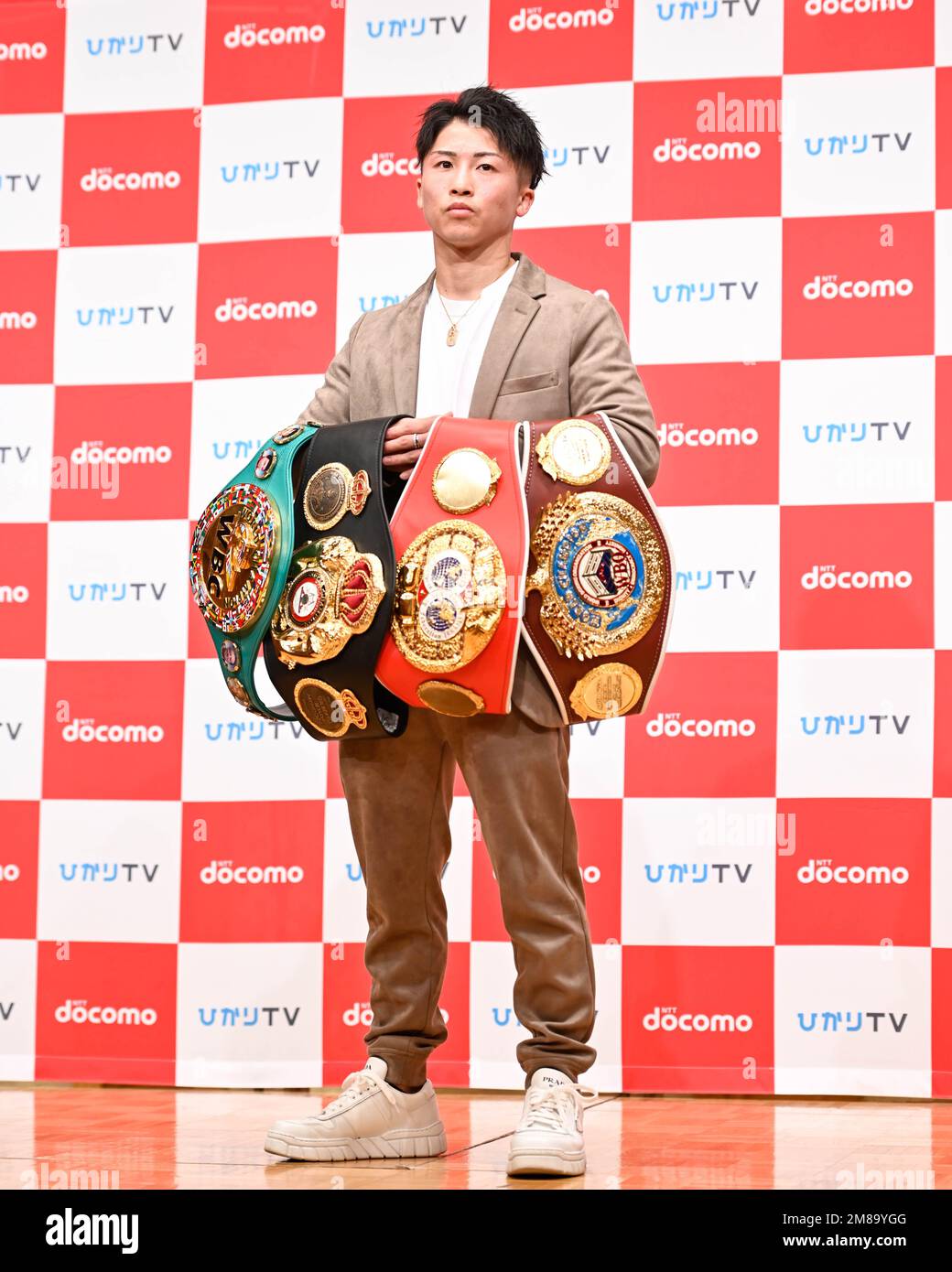 Boxer Naoya Inoue of Japan poses for photographs during a press conference in Yokohama, Kanagawa ...