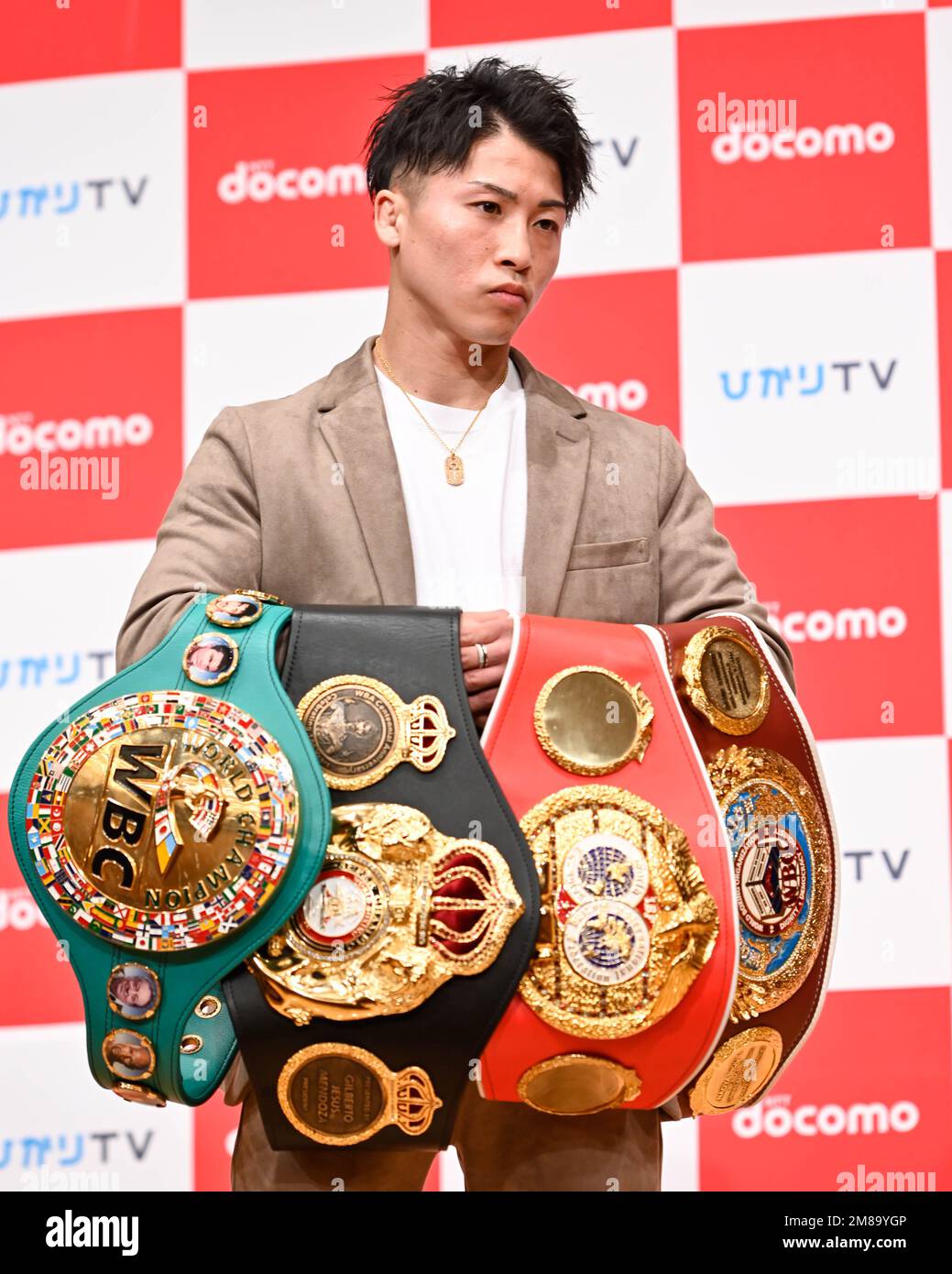 Boxer Naoya Inoue of Japan poses for photographs during a press conference in Yokohama, Kanagawa ...