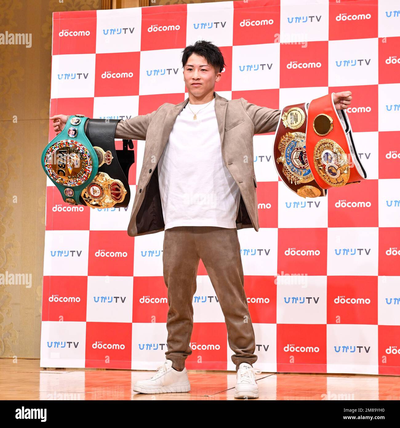 Boxer Naoya Inoue of Japan poses for photographs during a press conference in Yokohama, Kanagawa ...
