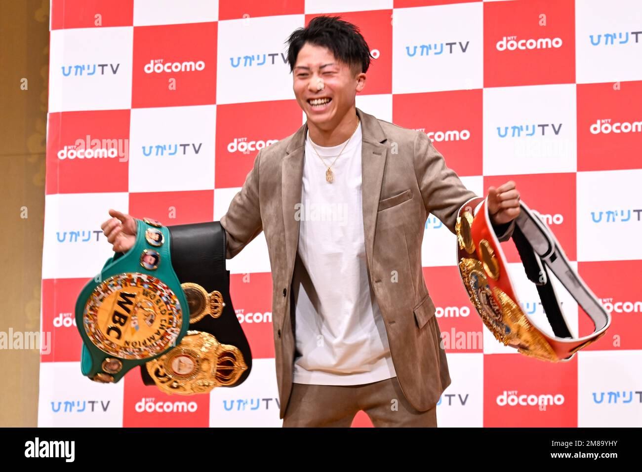 Boxer Naoya Inoue of Japan poses for photographs during a press conference in Yokohama, Kanagawa ...