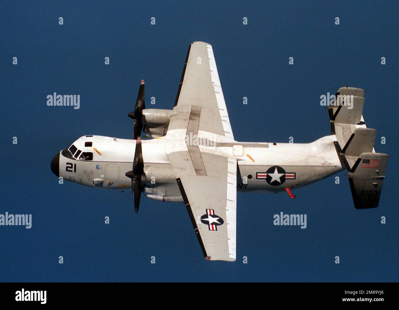 An air-to-air left side view of a C-2A Greyhound carrier on-board ...