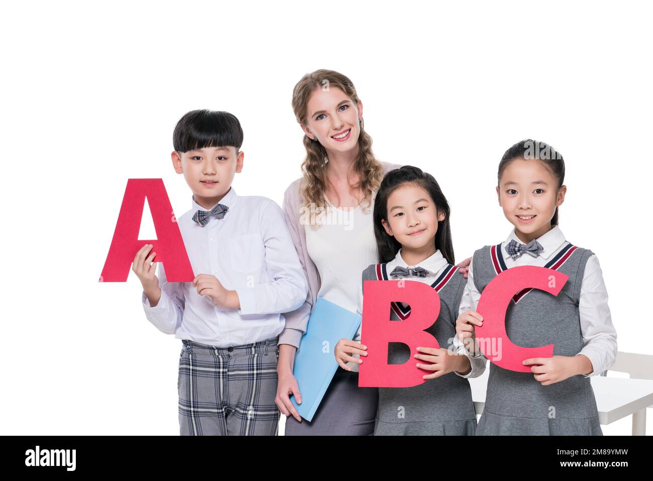Female teachers guide students learning Stock Photo - Alamy