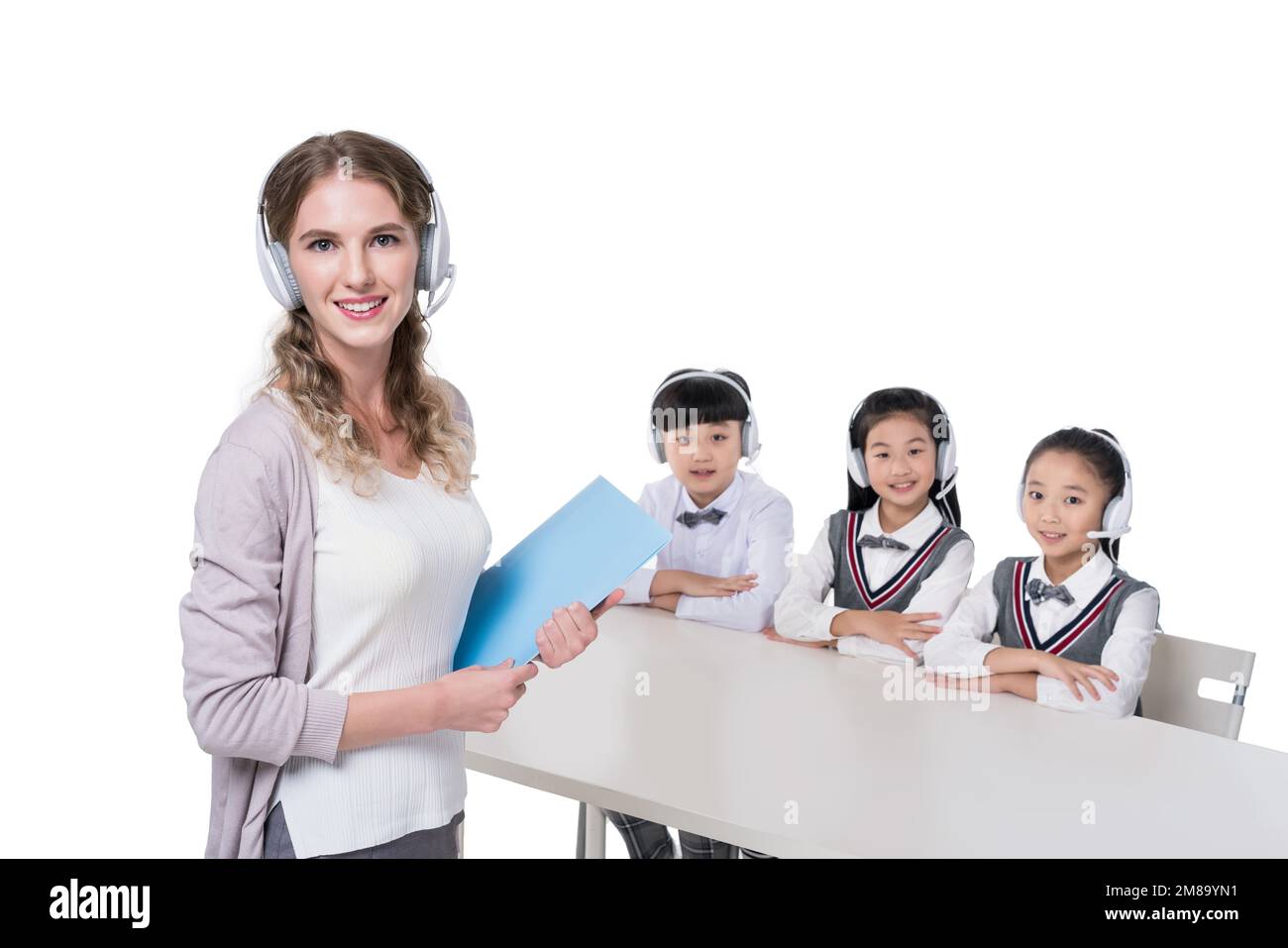 Female teachers guide students learning Stock Photo - Alamy