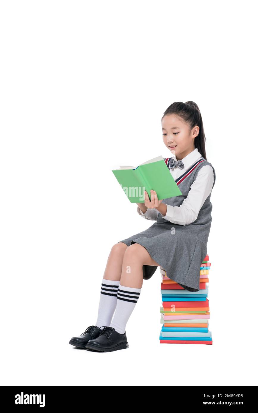 Happy primary school and books Stock Photo - Alamy