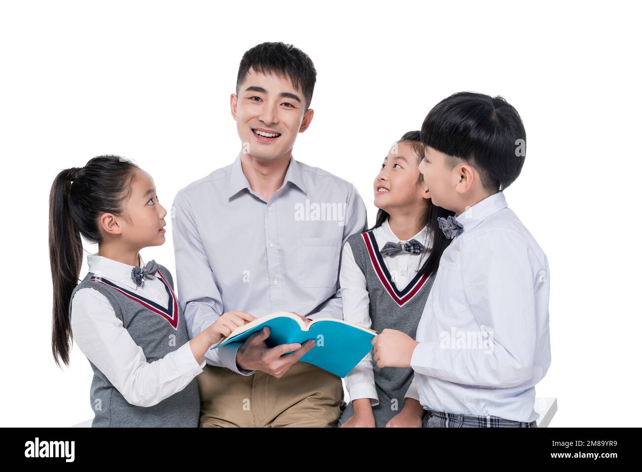 The teacher guiding students learning Stock Photo - Alamy