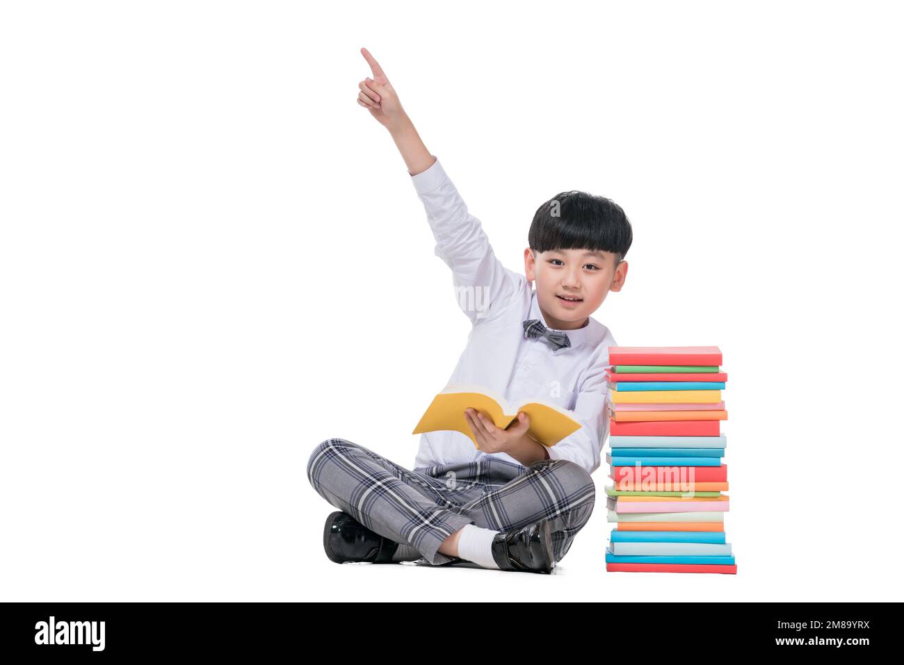 Happy primary school and books Stock Photo - Alamy
