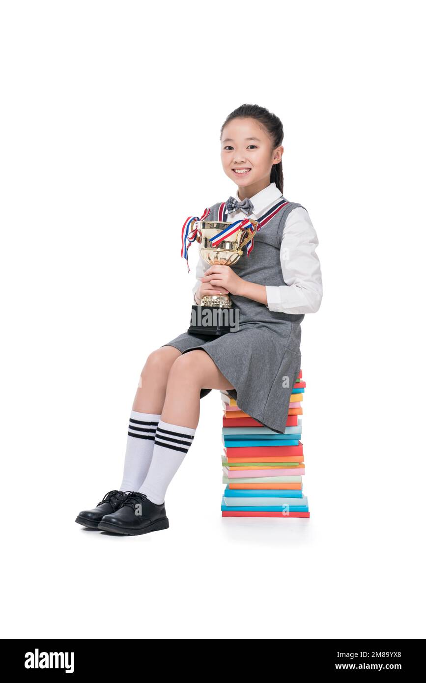 Happy primary school and books Stock Photo - Alamy