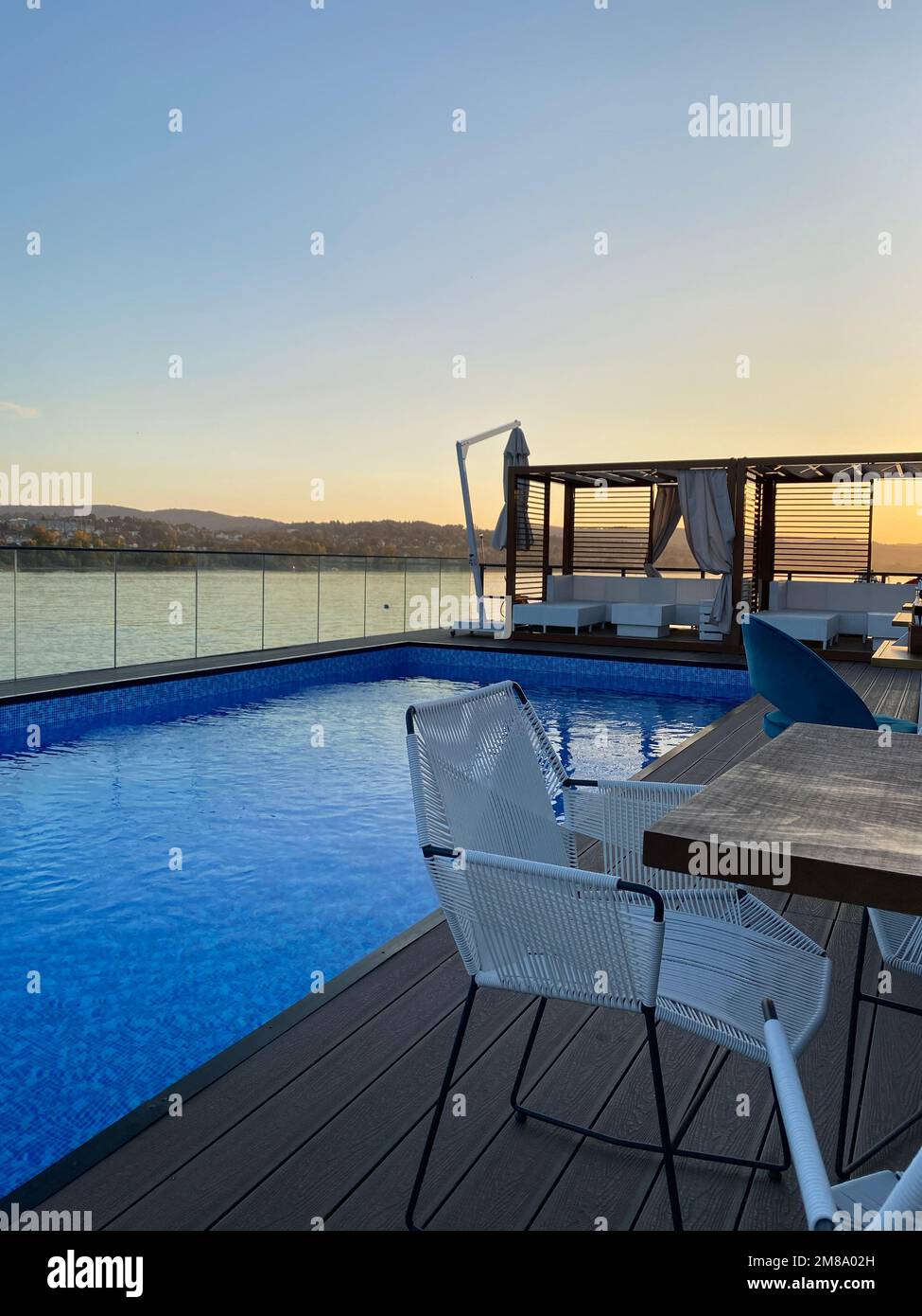 An aerial view of swimming pool in beach during sunset Stock Photo - Alamy