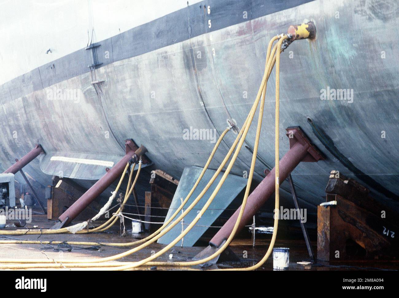 A close-up view of supports anchoring the guided missile frigate USS ...