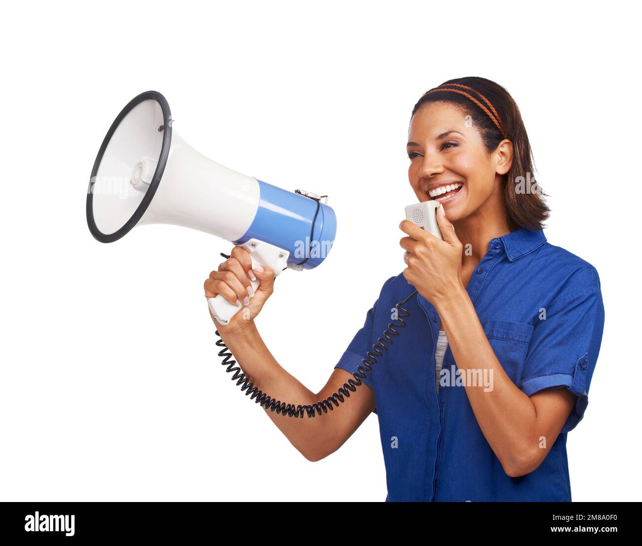 Hear me. A friendly african-american woman talking into a megaphone ...