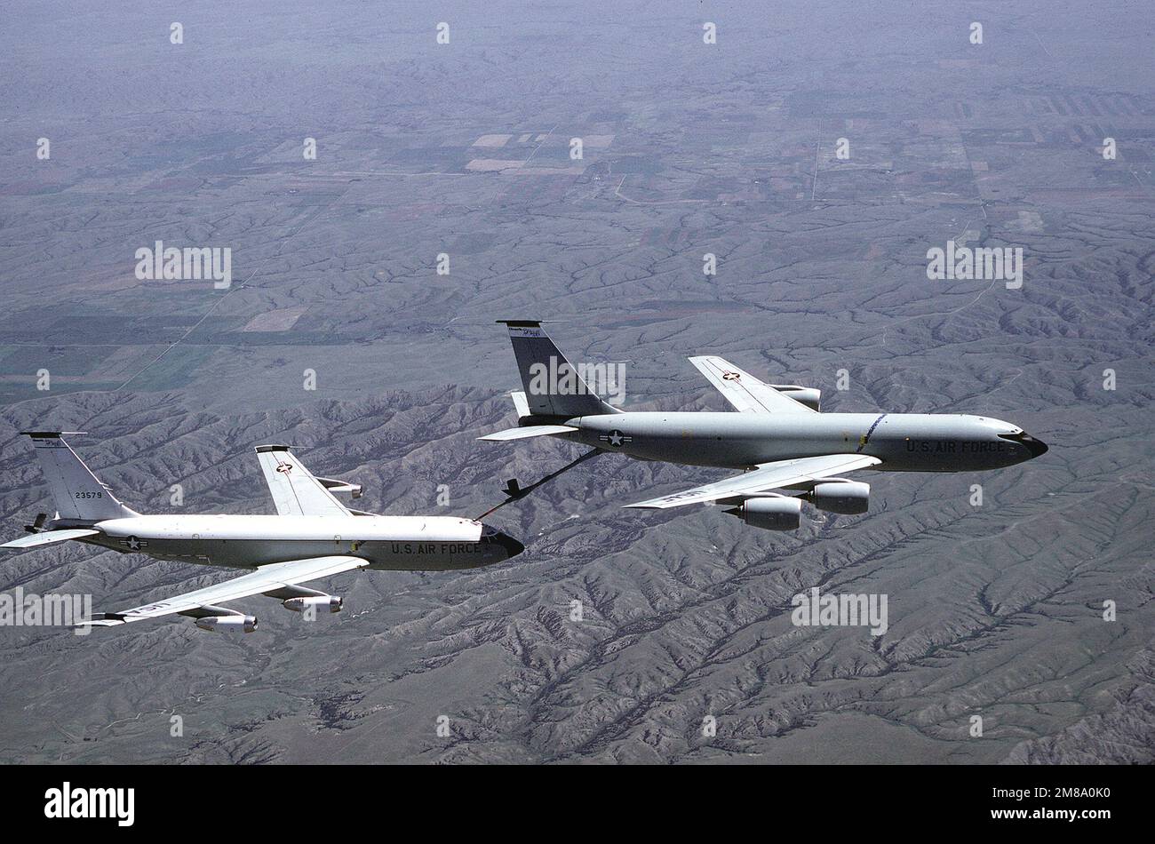 An air-to-air right side view of a 28th Bombardment Wing KC-135R ...