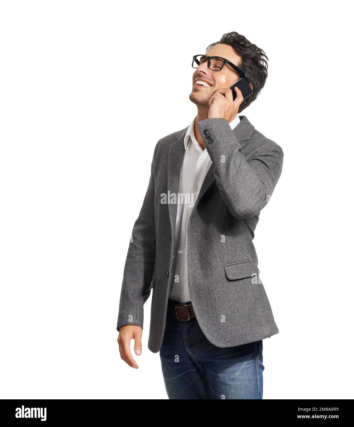 Having a friendly phone conversation. A handsome young man talking ...