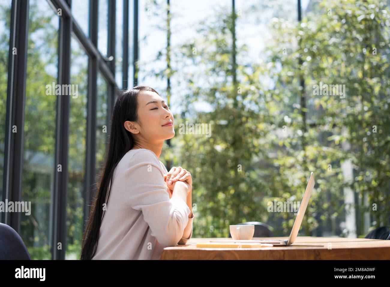 A young woman use the computer Stock Photo - Alamy