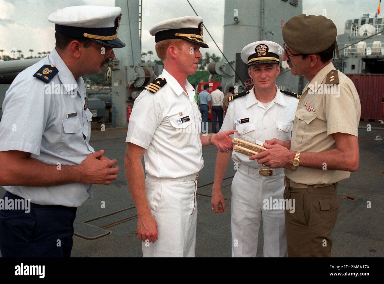 CHIEF Warrant Officer Kabick, left, CMDR. Hank Prevette, commanding ...