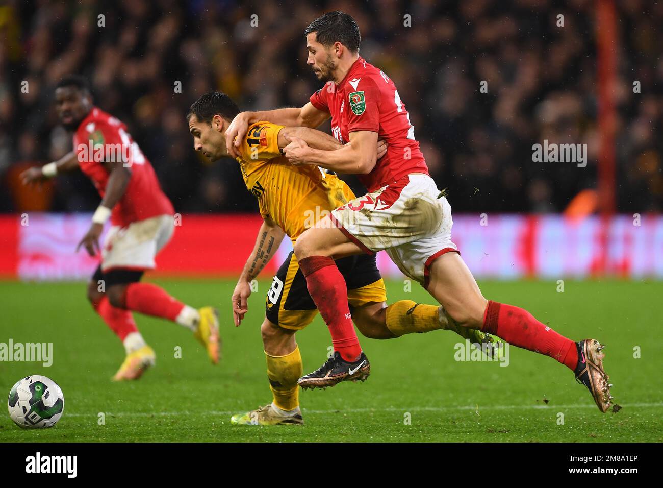 Jonny of Wolverhampton Wanderers under pressure from Remo Freuler of ...