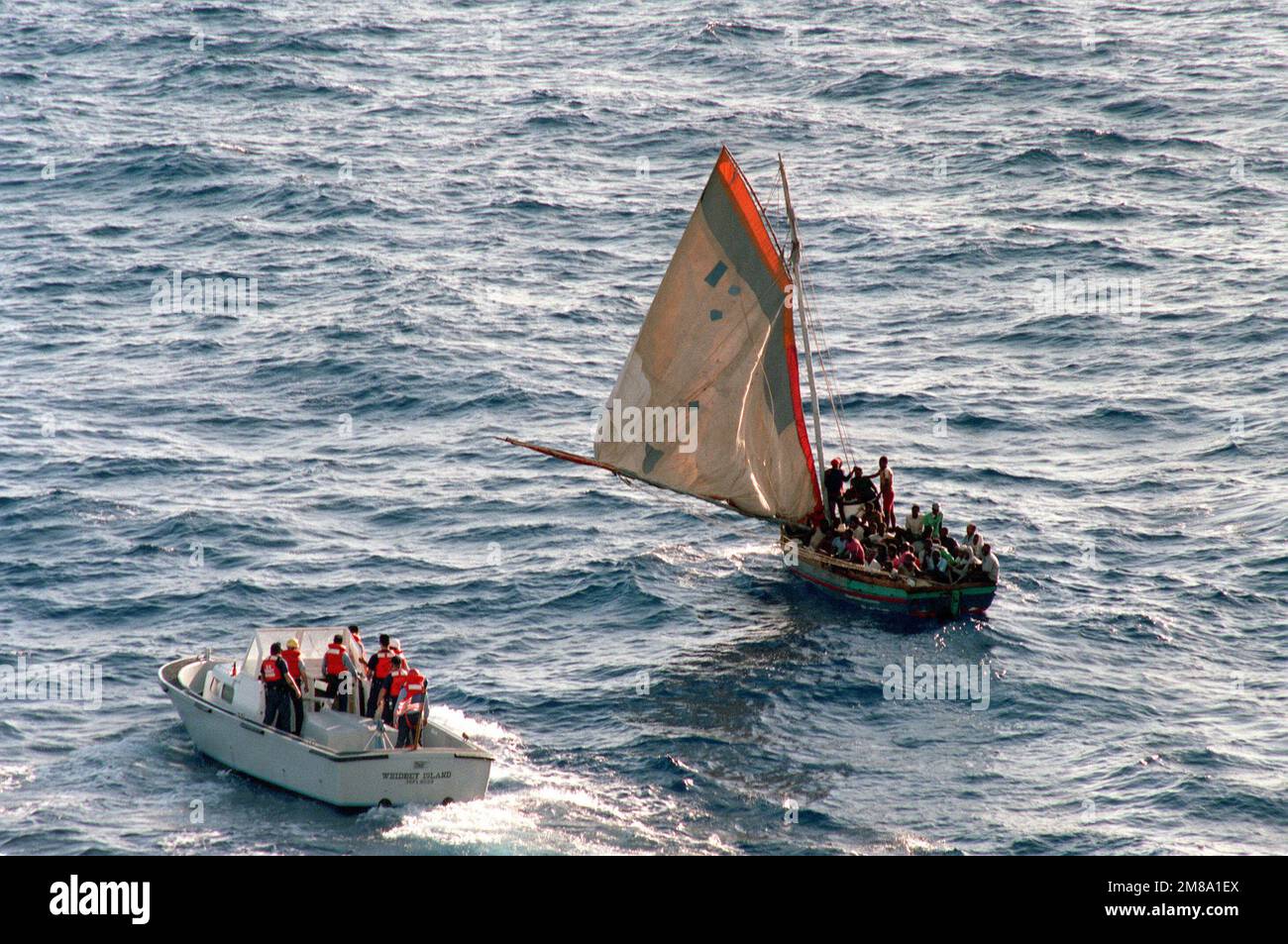 Sailors and US Coast Guard District 5 Law Enforcement Detachment ...
