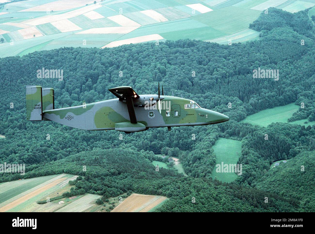 An air-to-air right side view of a 10th Military Airlift Squadron C-23 ...