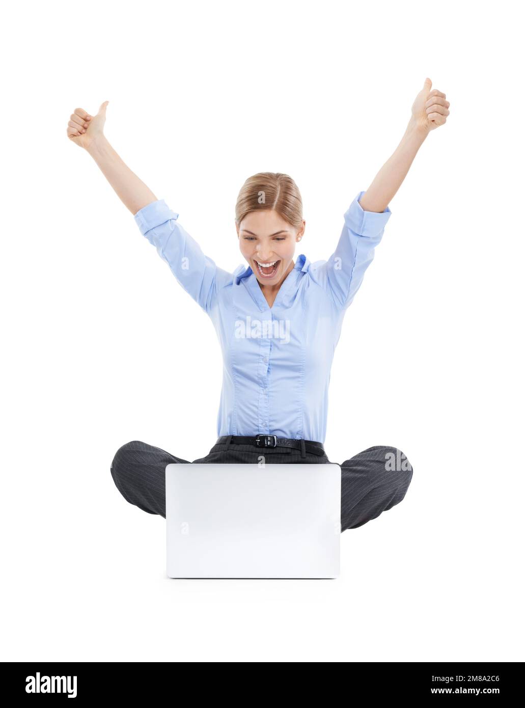 Thumbs up, celebration and business woman with laptop in studio ...