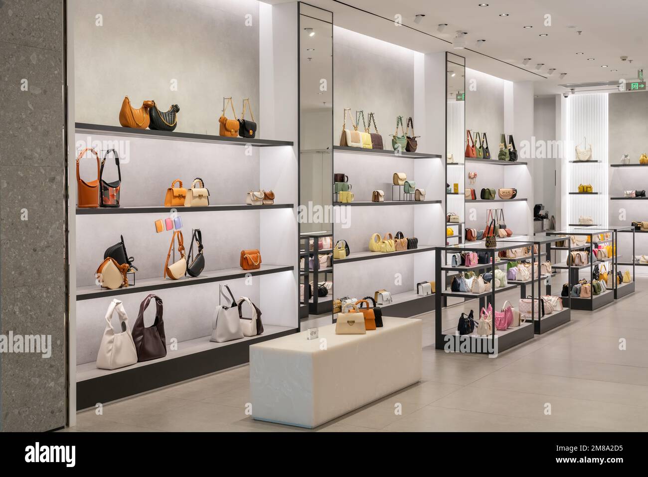 A luxury fashion store front in modern shopping mall Stock Photo - Alamy