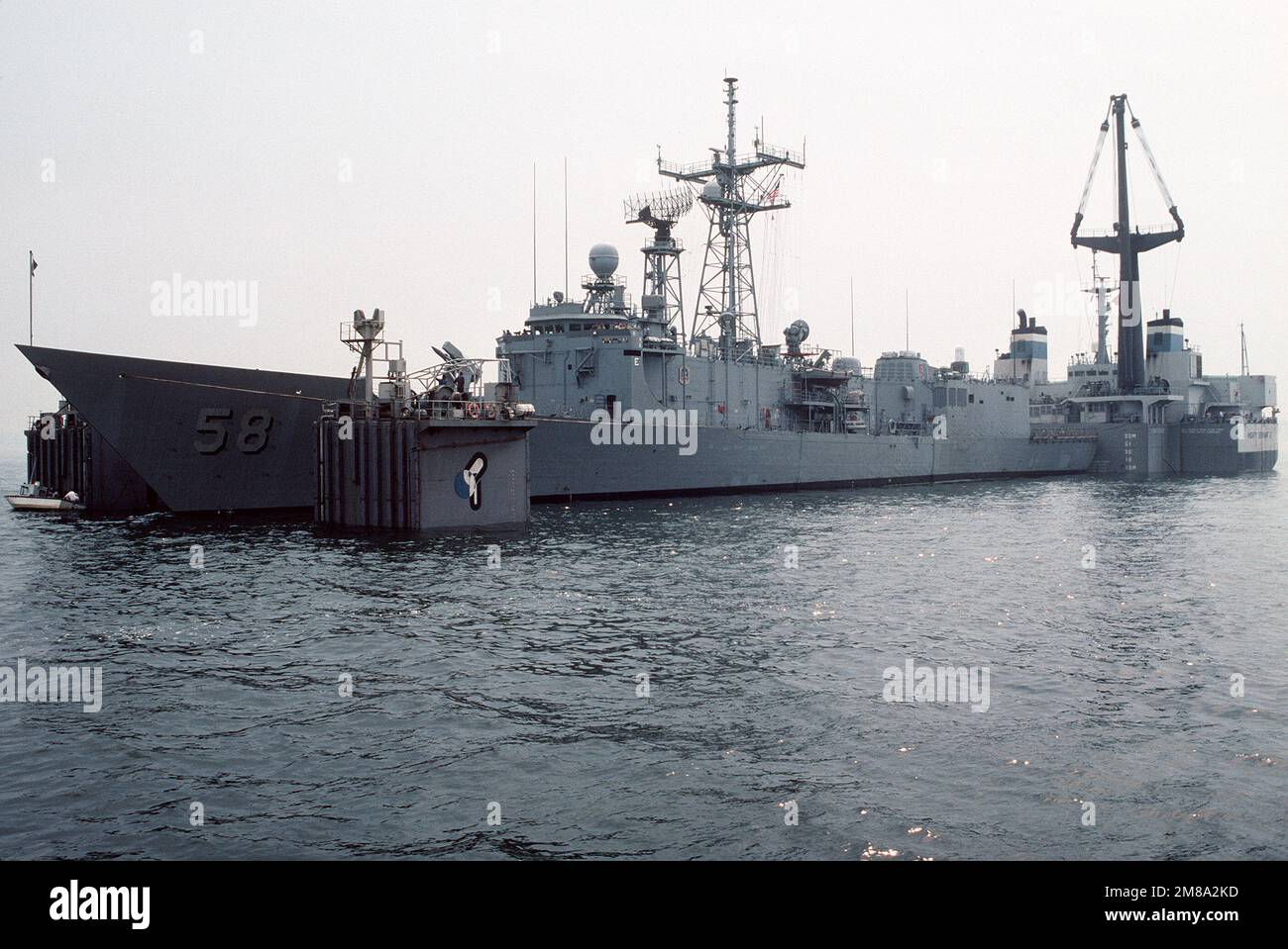 A port bow view of the damaged guided missile frigate USS SAMUEL B ...