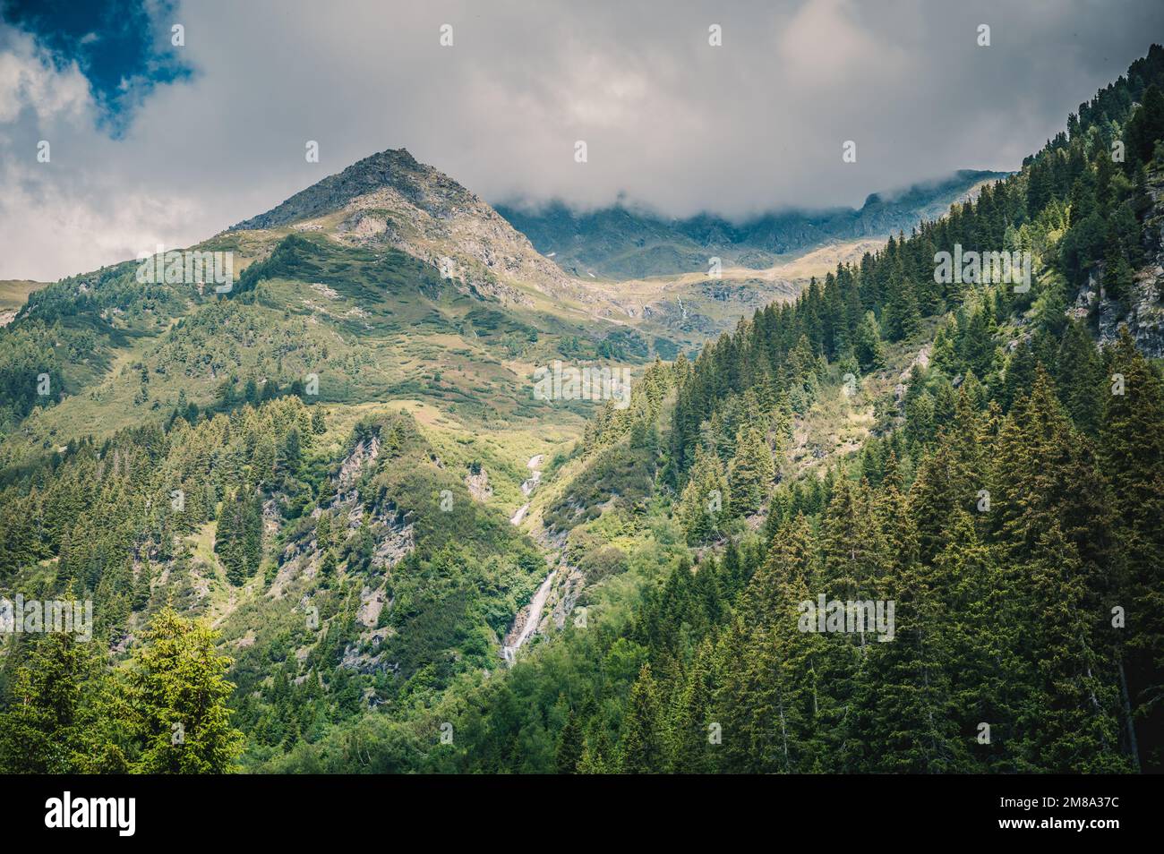 A scenic view of a beautiful landscape with valleys and mountains seen ...