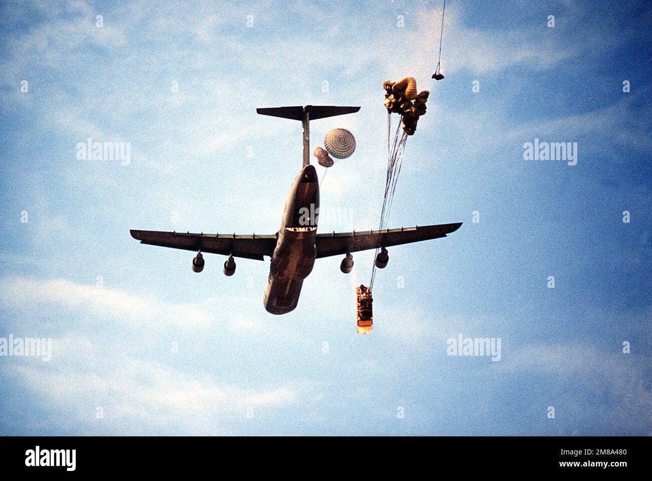 An M-551 Sheridan light tank is dropped from the rear of a 436th ...