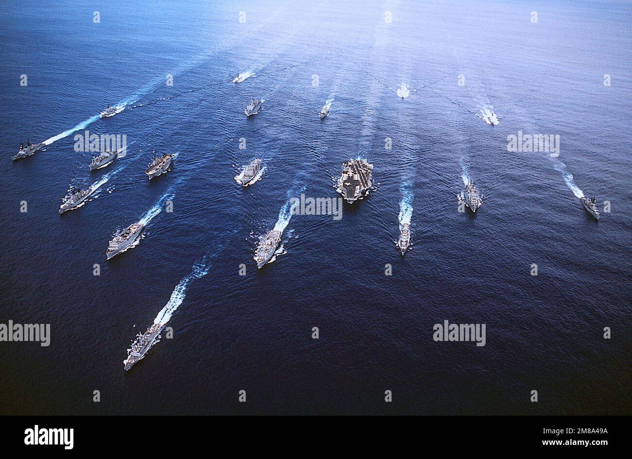 An aerial view of ships of the aircraft carrier USS JOHN F. KENNEDY (CV ...