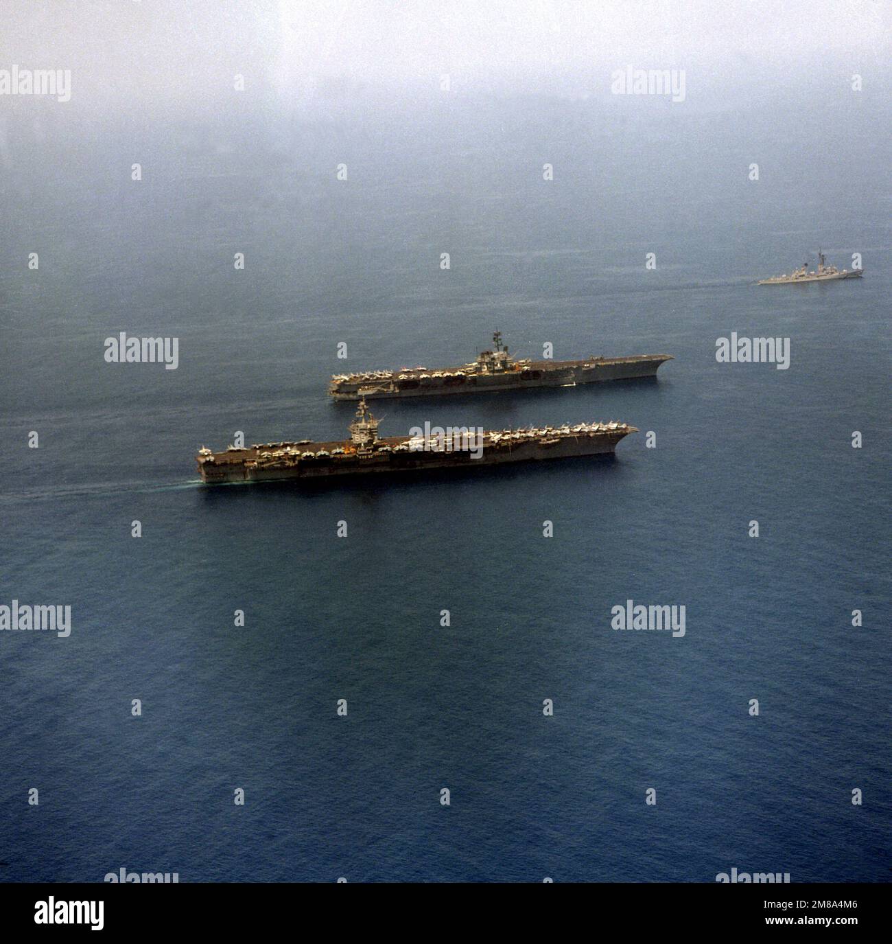 A starboard view of the nuclear-powered aircraft carrier USS ENTERPRISE ...