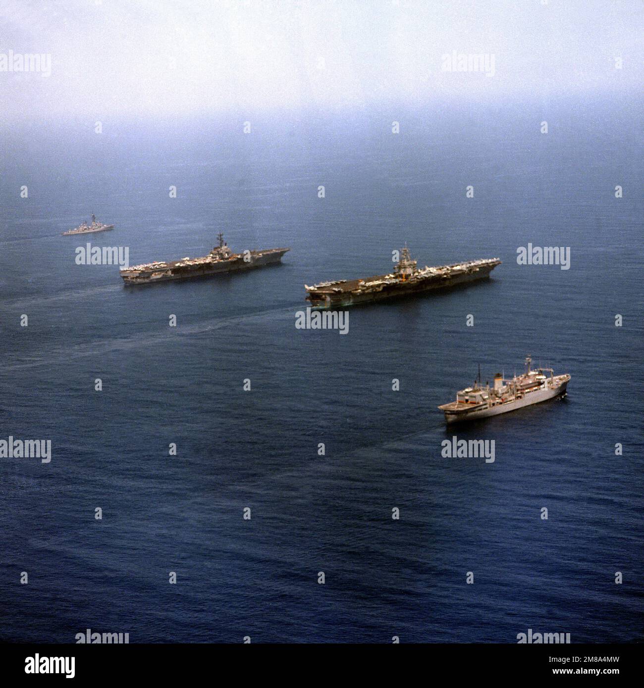 A starboard quarter view of, from right to left, a Lyness class combat ...