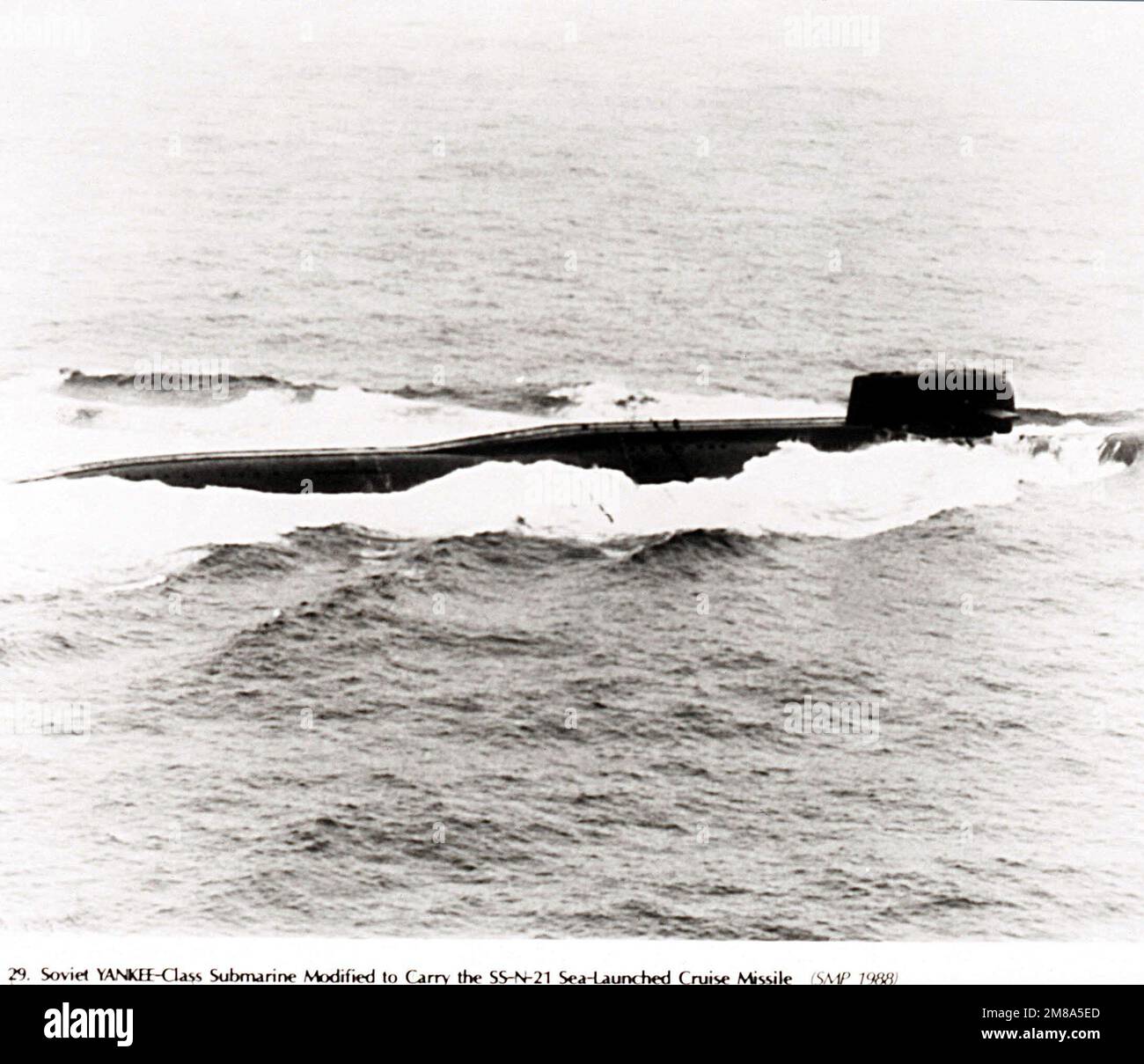 A starboard view of a Soviet Yankee I class submarine underway. The ...