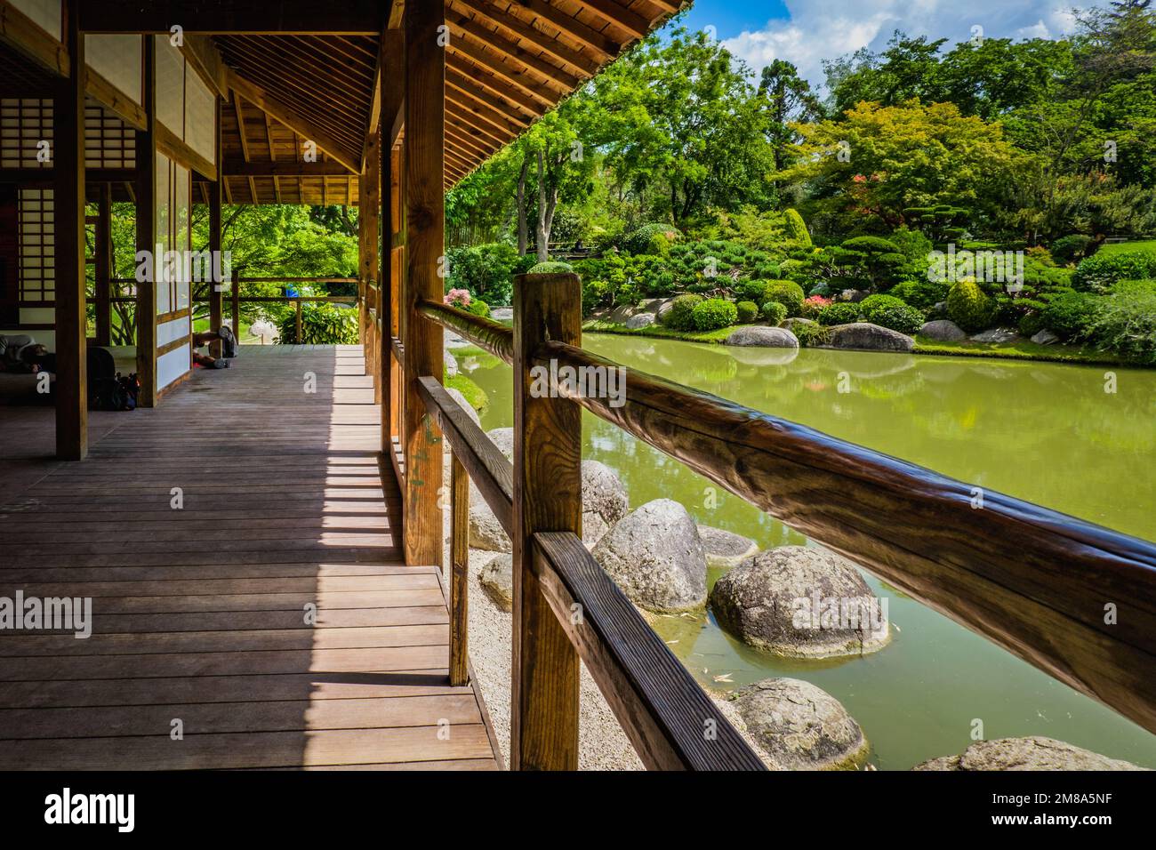 The wooden traditional japanese building and pond of the japanese ...