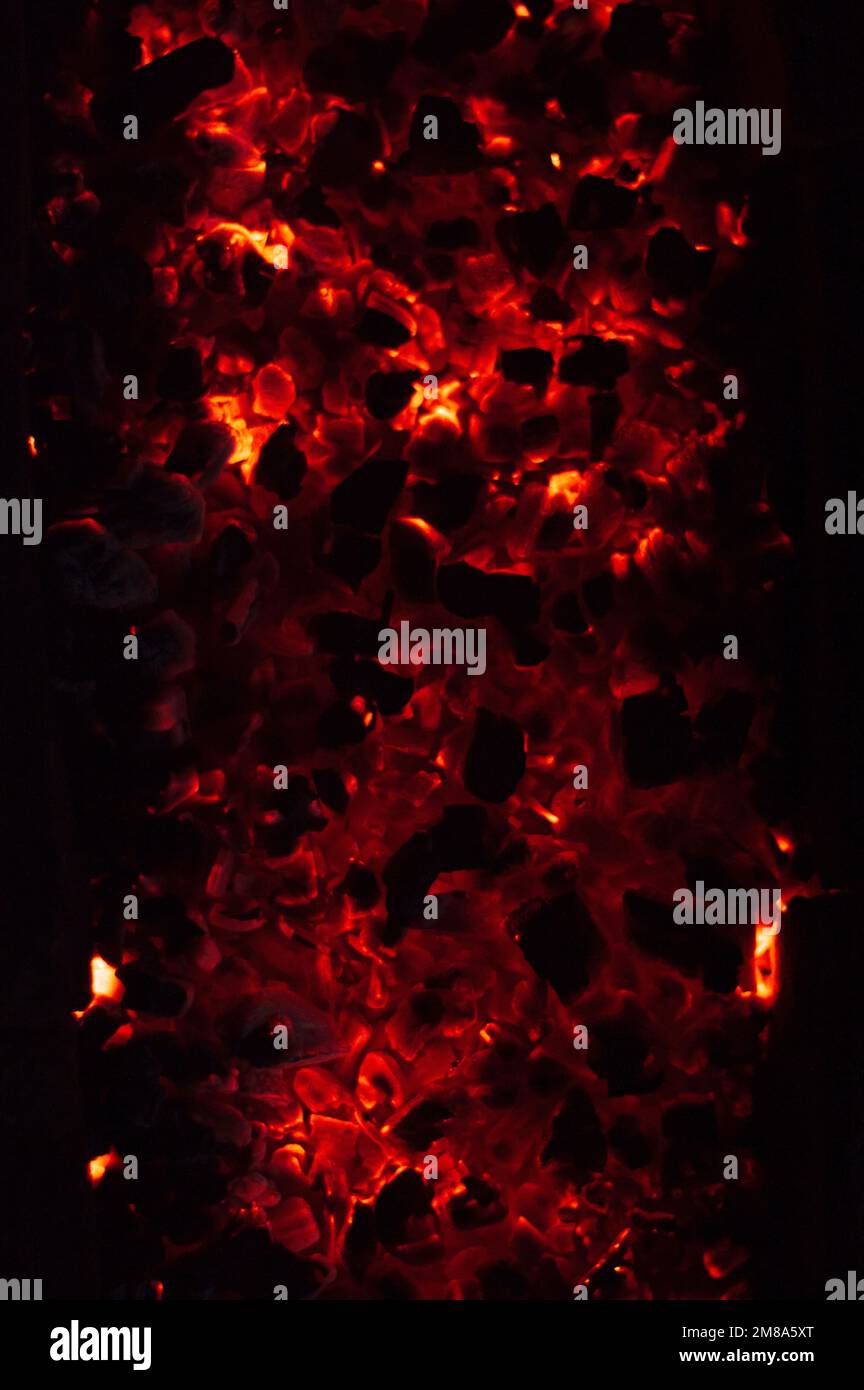 A vertical top view closeup of hot smoldering ashes form a fire Stock Photo - Alamy