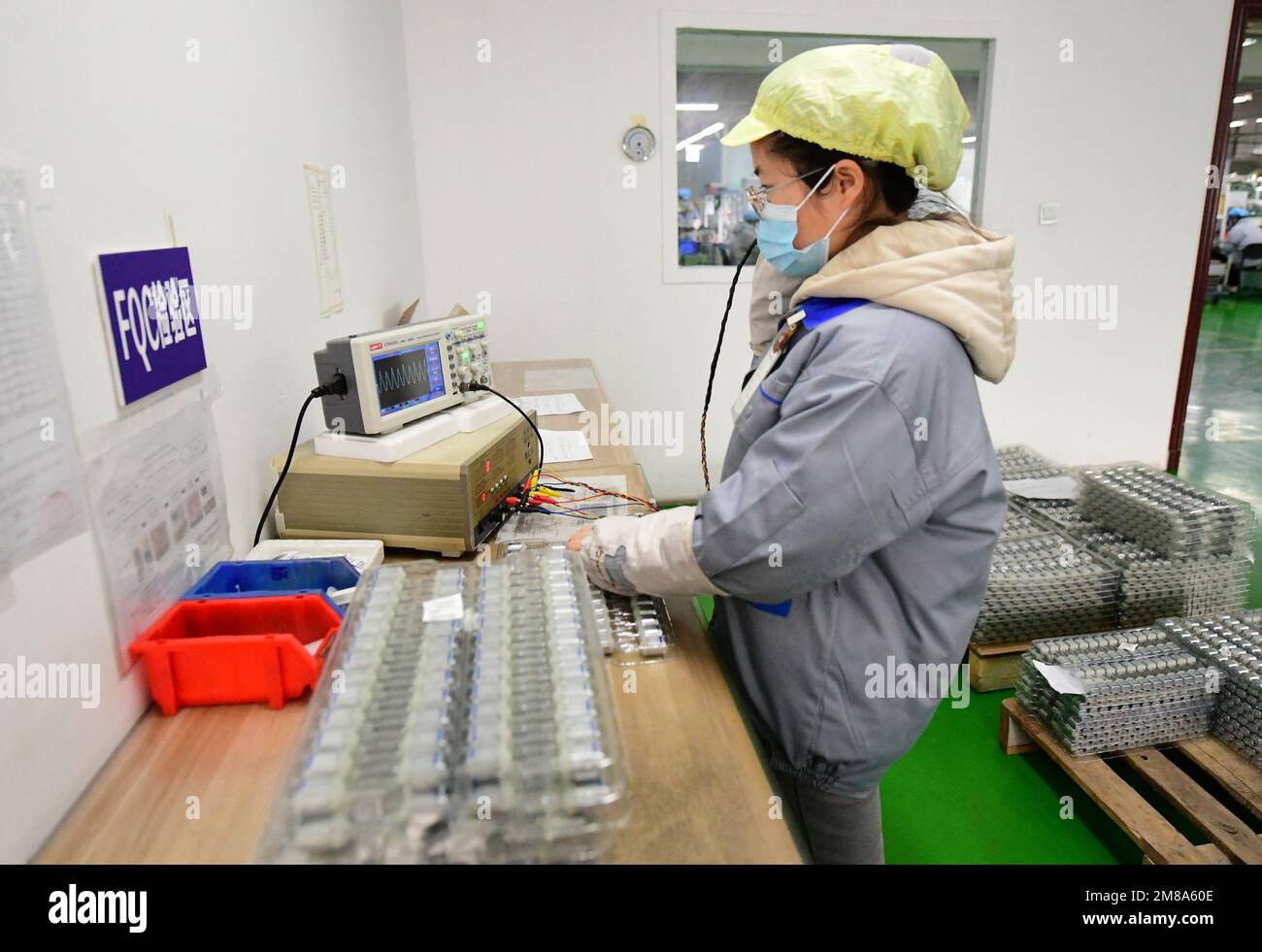 HAI'AN, CHINA - JANUARY 13, 2023 - Workers make miniature DC motors on ...