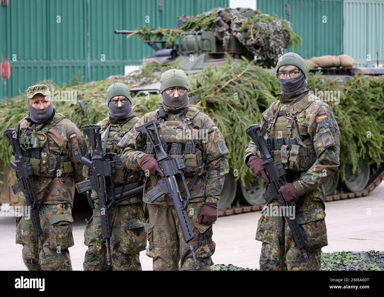 Marienberg, Germany. 12th Jan, 2023. Armored infantrymen stand next to ...