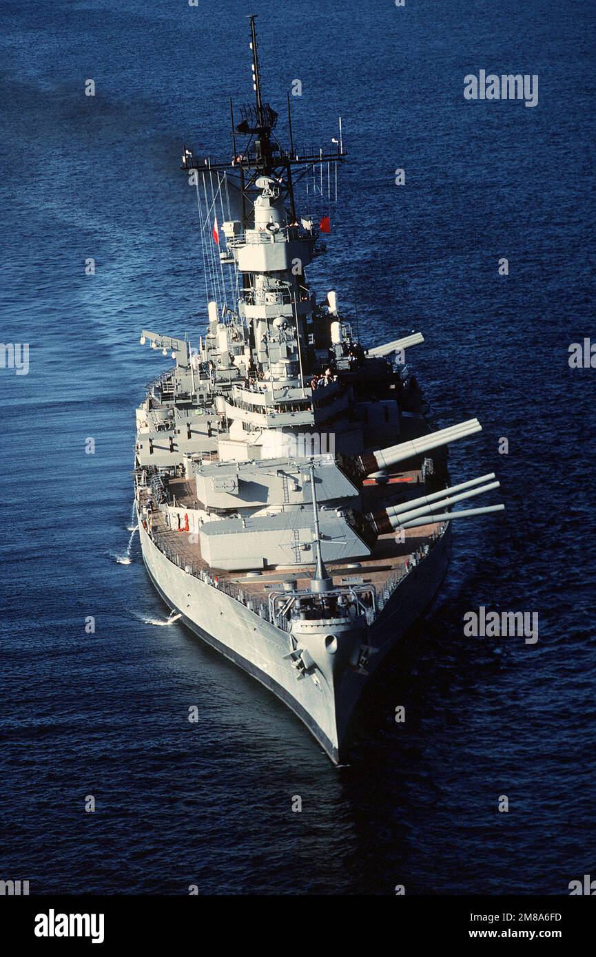 A bow view of the battleship WISCONSIN (BB-64) with all nine of its ...