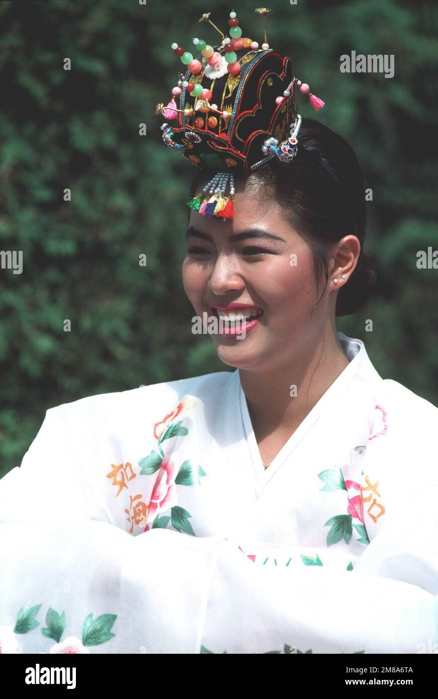 A South Korean volunteer at the XXIVth Olympiad. Base: Seoul Country ...