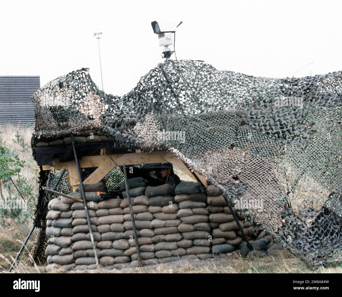 Two members of the 66th Security Police Squadron stand watch in a ...