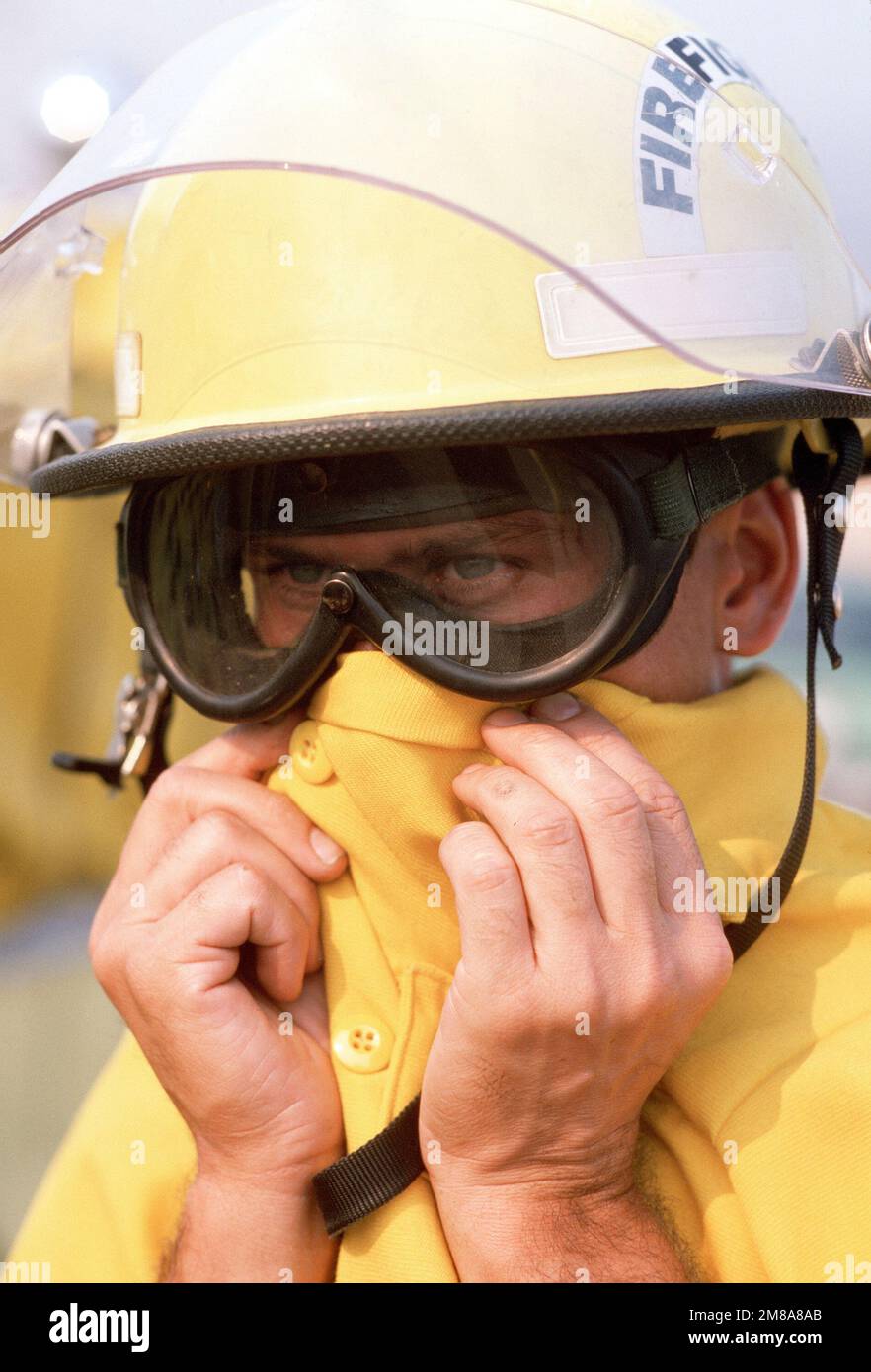 An Air Force firefighter from the 63rd Civil Engineering Squadron ...