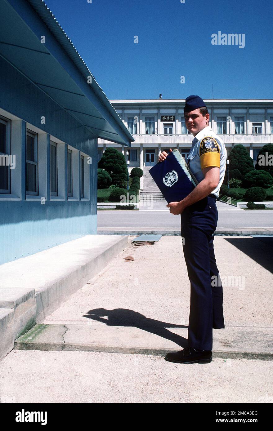 STAFF SGT. Jim Baker straddles the Demarcation Line that separates ...