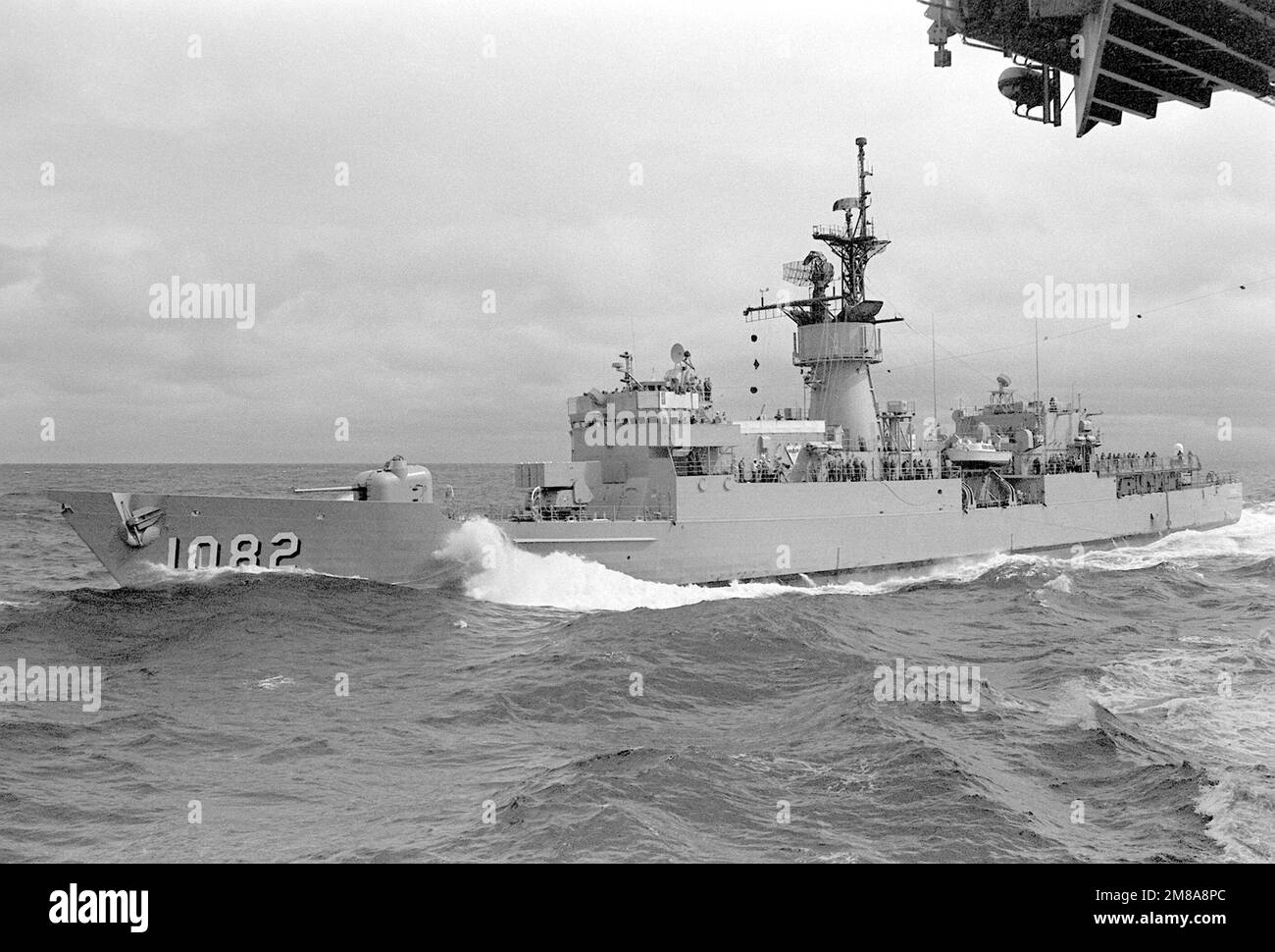 A port bow view of the frigate USS ELMER MONTGOMERY (FF-1082) as it ...