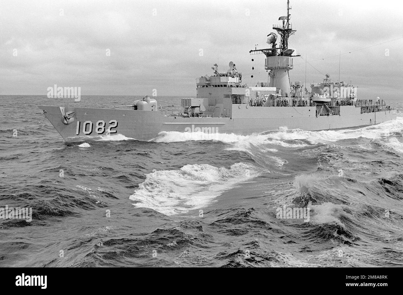 A port bow view of the frigate USS ELMER MONTGOMERY (FF-1082) as it ...