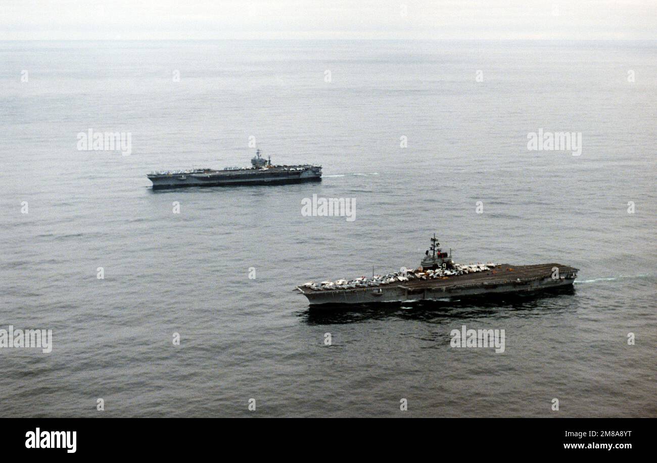 An aerial port view of the aircraft carrier USS FORRESTAL (CV-59 ...