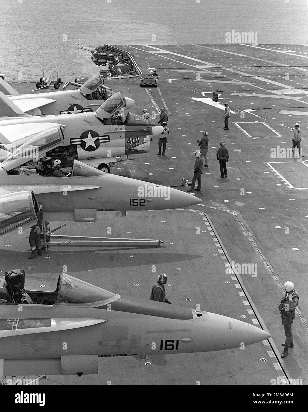 A TF/A-18A Hornet aircraft, foreground, an F/A-18A Hornet aircraft and ...