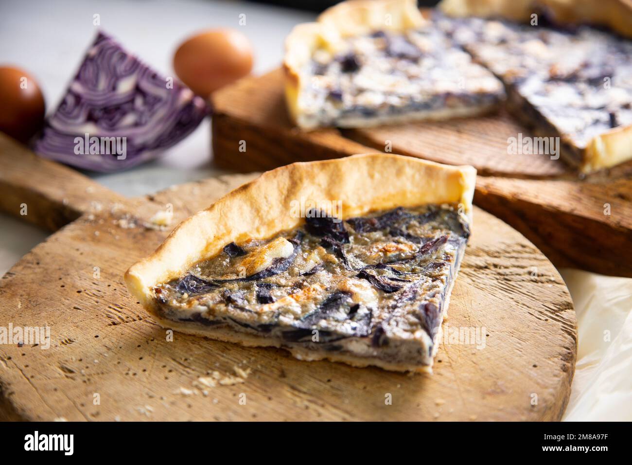 Red cabbage French quiche. In gastronomy, a quiche is a type of savory ...