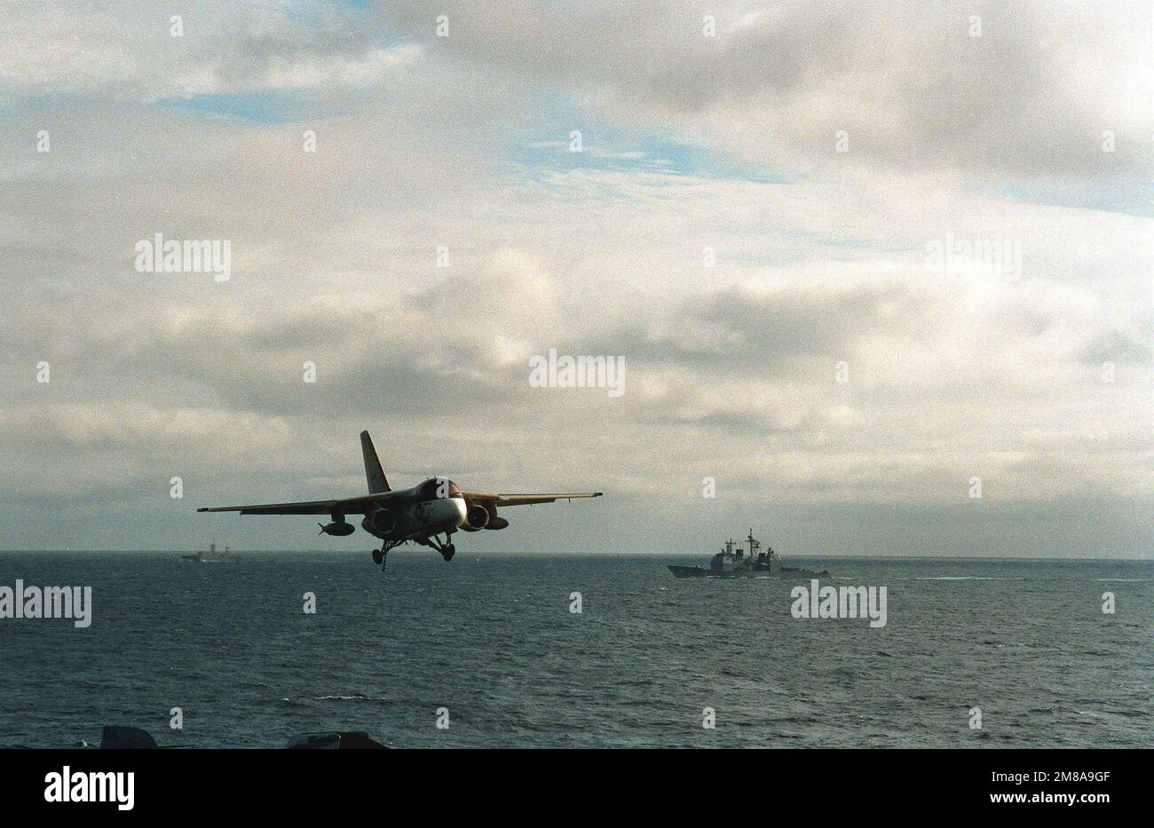 An S-3A Viking aircraft comes in for a landing on the flight deck of ...