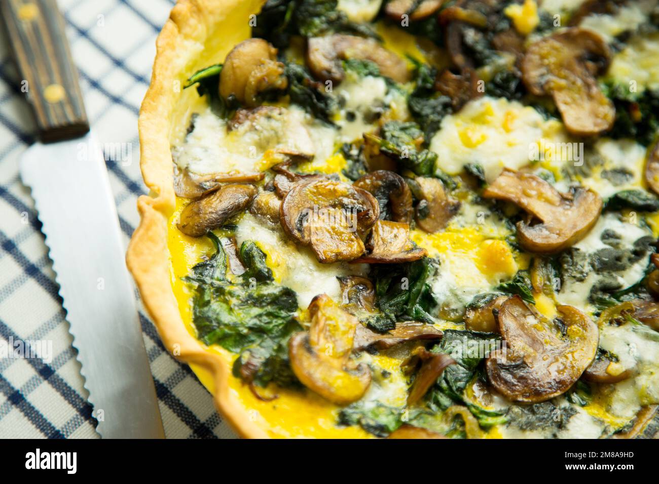 Spinach mushrooms French quiche. In gastronomy, a quiche is a type of ...