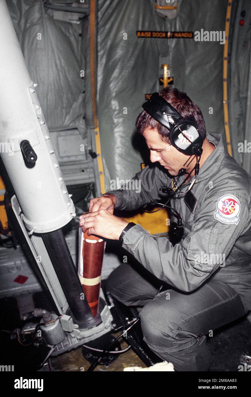 Aboard a WC-130H Hercules aircraft of the 53rd Weather Reconnaissance ...